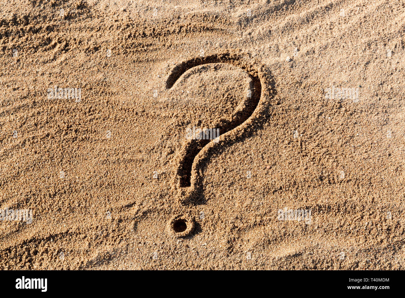 question marks written on beach sand close up, with copy space Stock ...