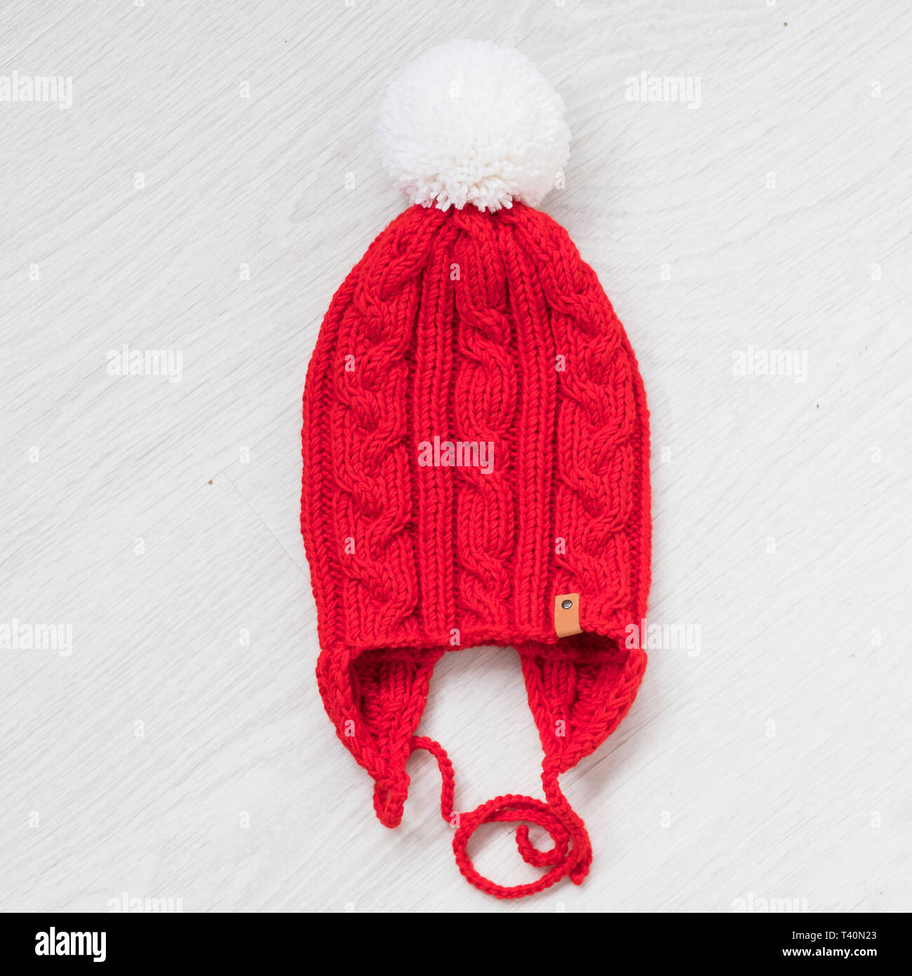 cute cozy knitted children winter red hat Stock Photo - Alamy