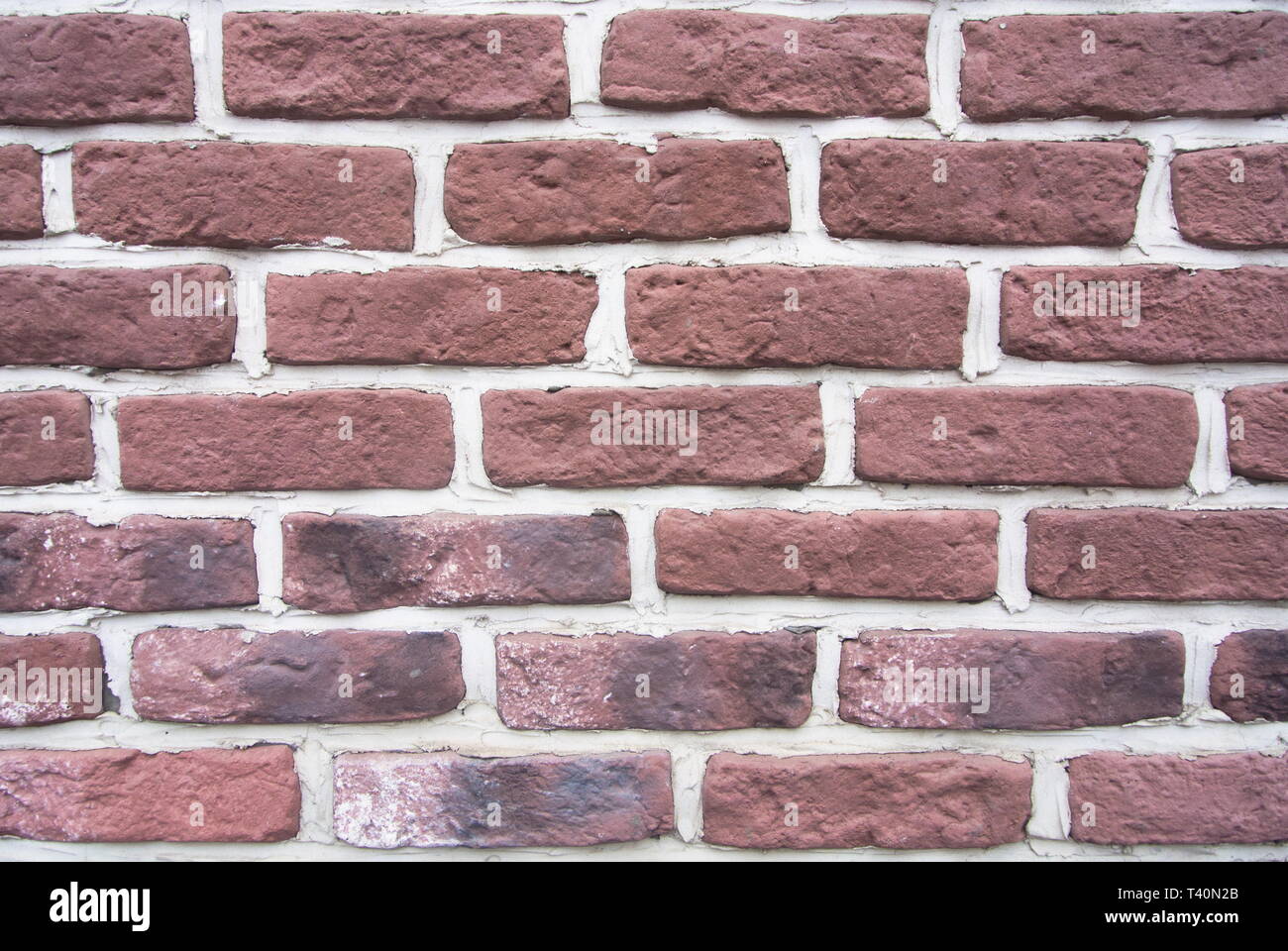 Wall texture of facing brick with areas of burnout Stock Photo - Alamy