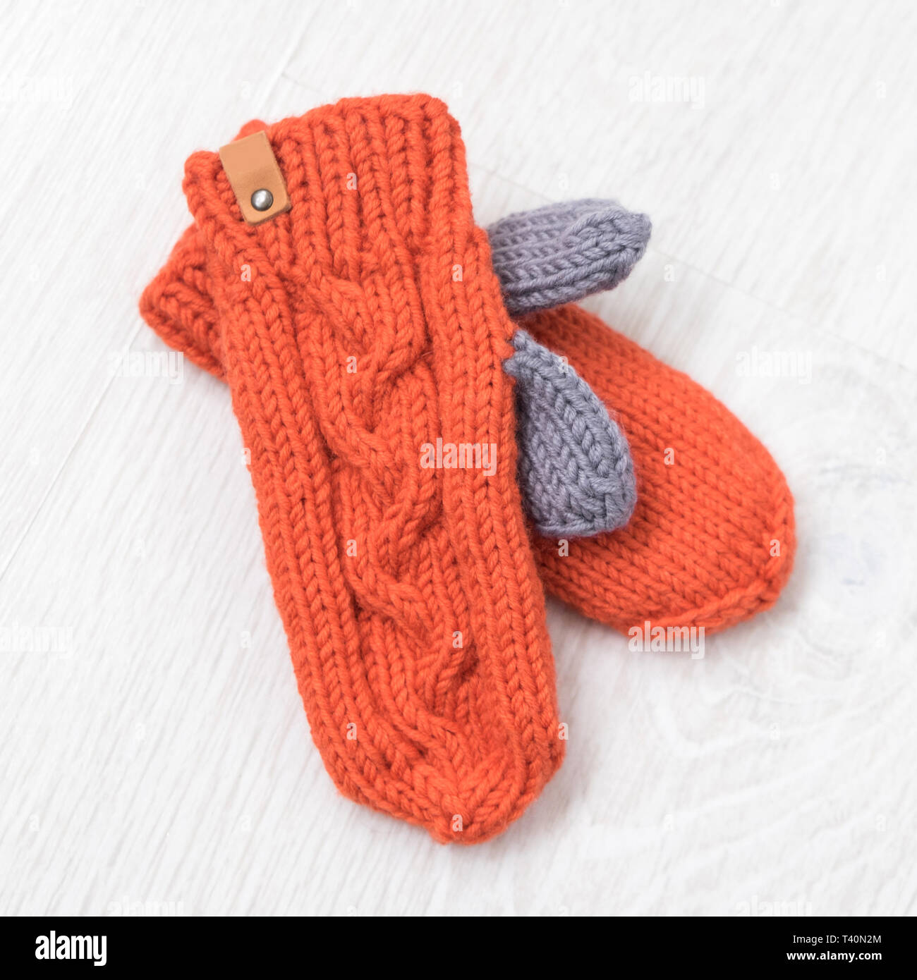 cute cozy knitted children winter mittens Stock Photo - Alamy