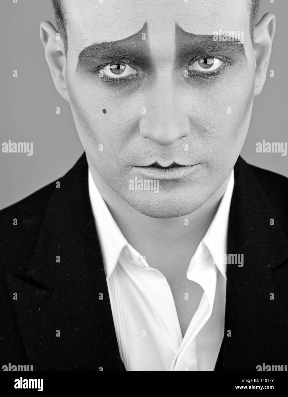 Having talent and charisma. Theatre actor miming. Mime with face paint ...