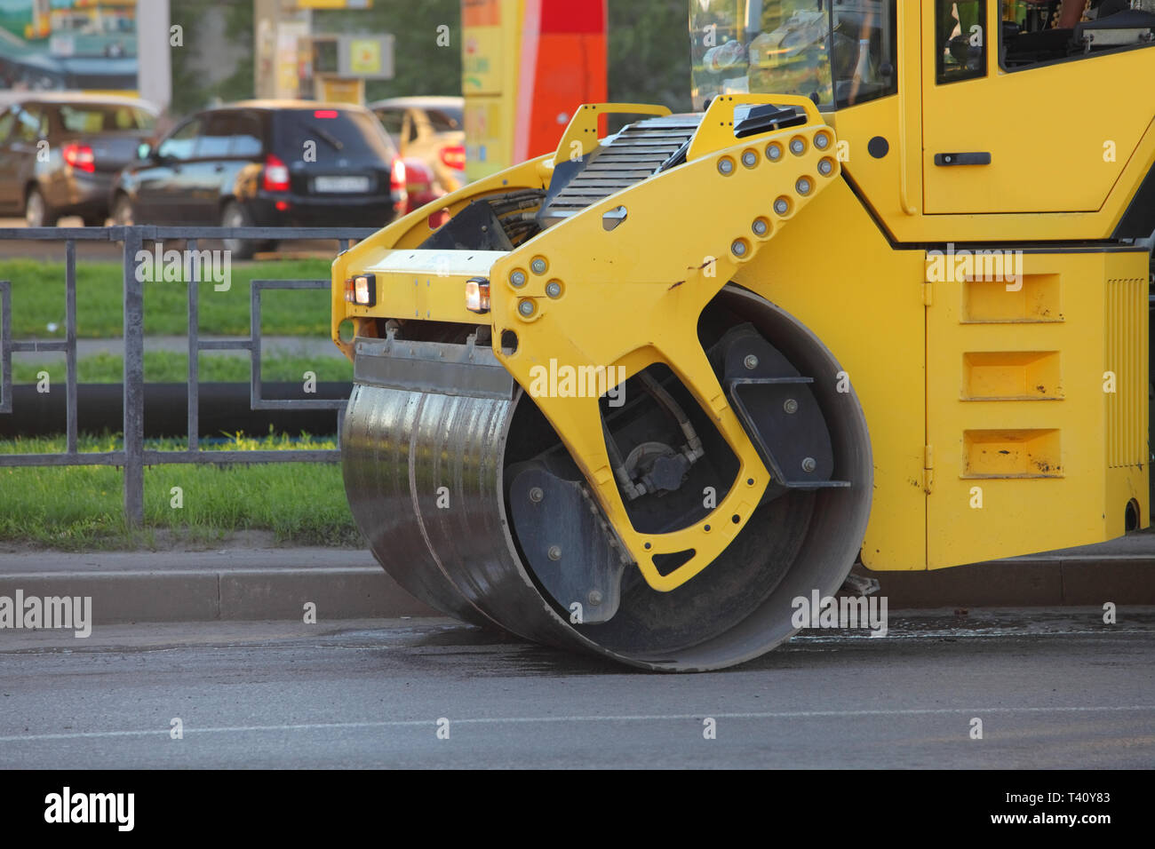 Yellow road roller in a new road highway construction Stock Photo - Alamy