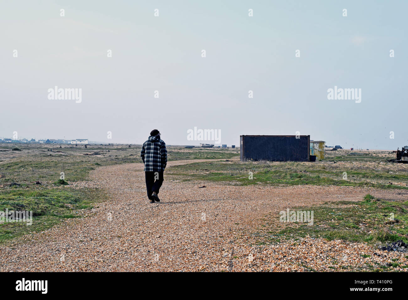 A landscape view of the flat pebble land at Dungeness Kent England with ...