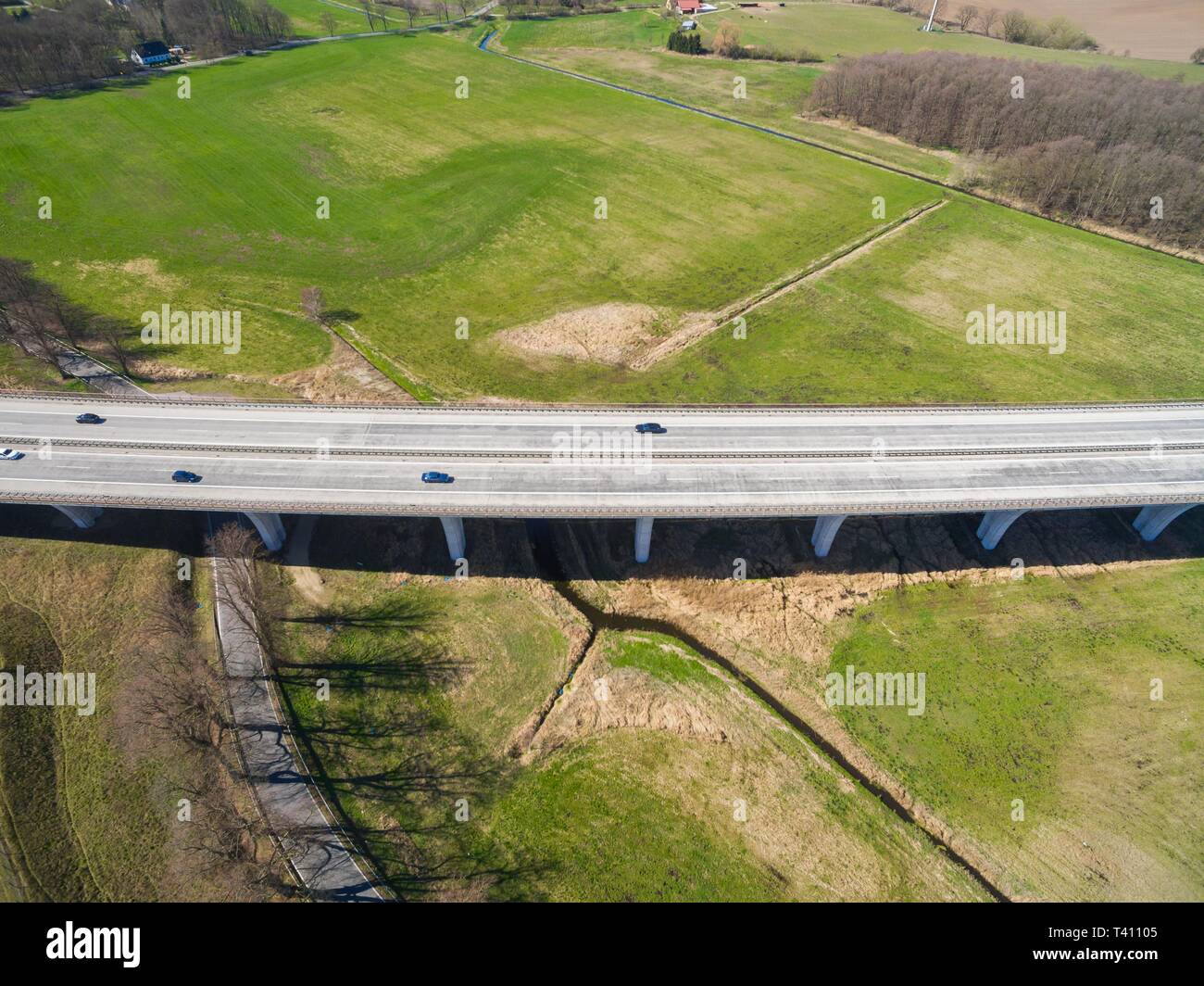 highway bridge in rural area - aerial view of a big highway bridge in ...