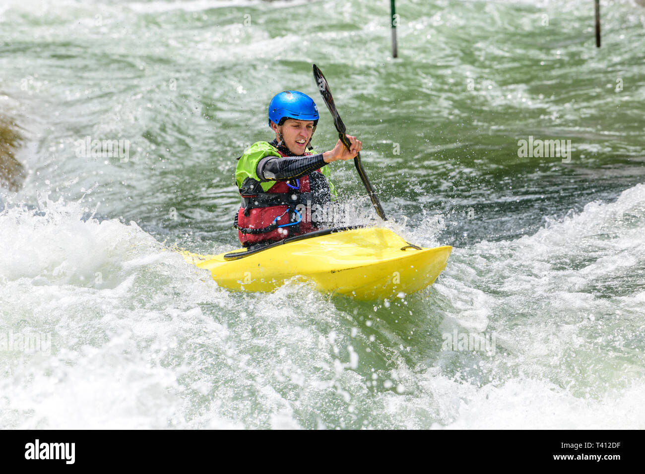 Kayaking on an artificial wild water channel Stock Photo - Alamy