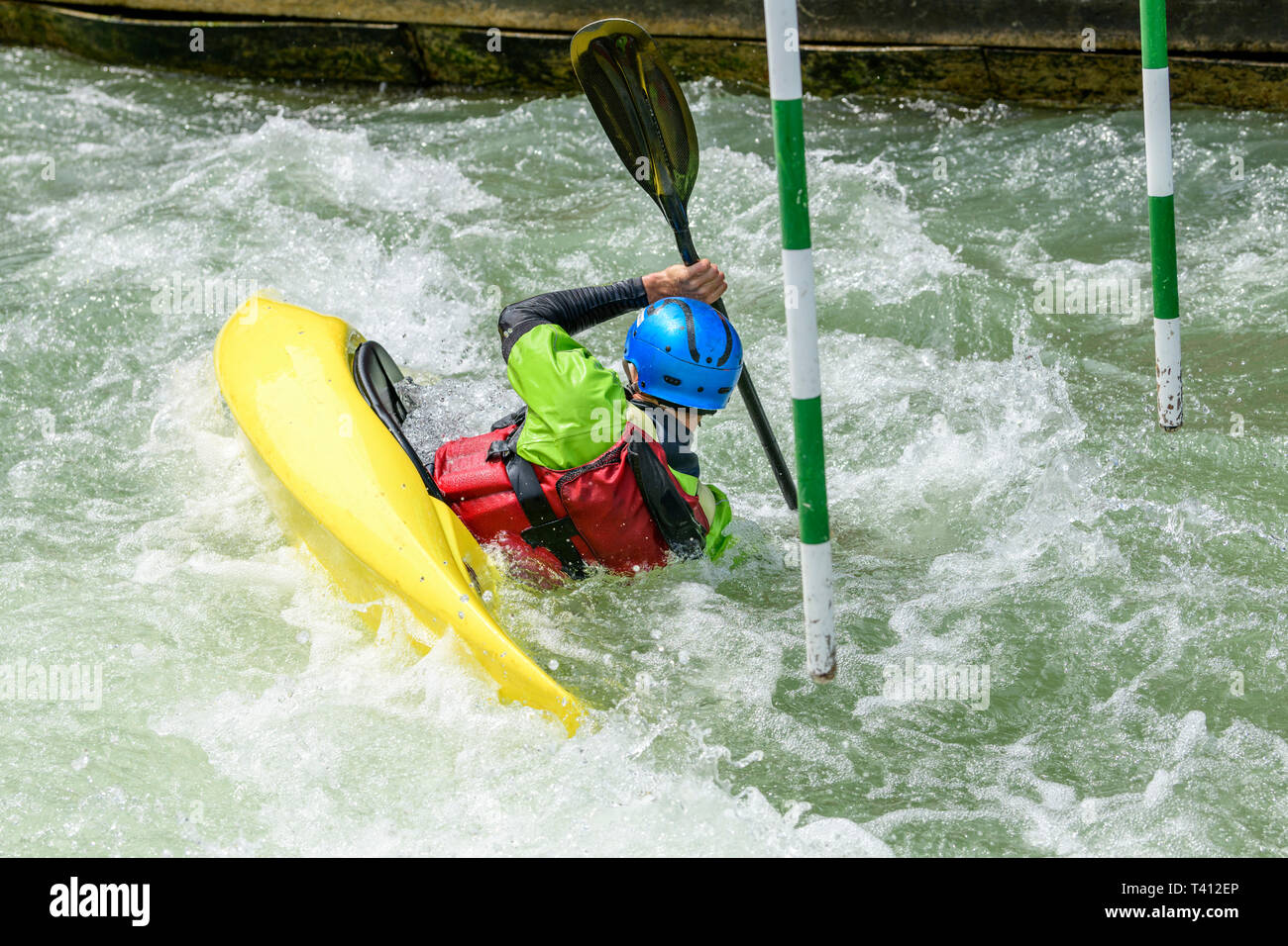 Kayaking on an artificial wild water channel Stock Photo - Alamy