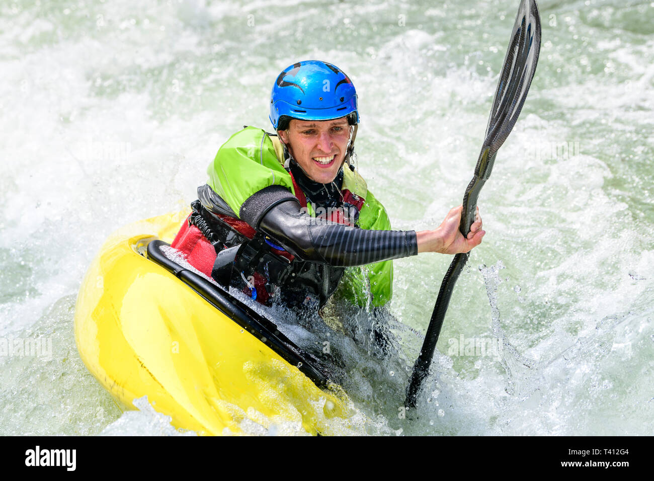 Kayaking on an artificial wild water channel Stock Photo - Alamy