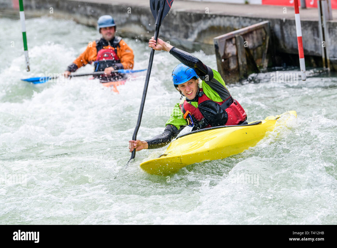 Kayaking on an artificial wild water channel Stock Photo - Alamy