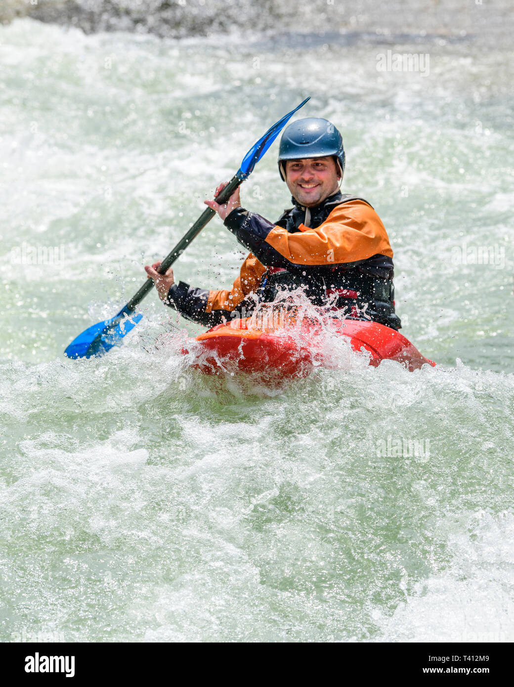 Kayaking on an artificial wild water channel Stock Photo - Alamy