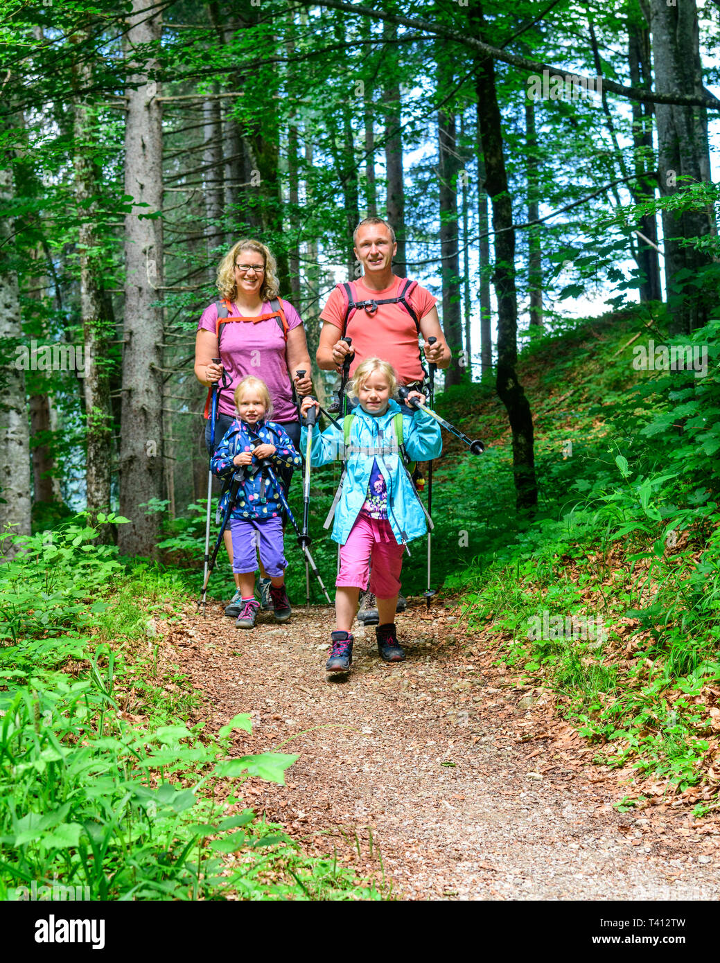 Family doing a hiking tour in impressive nature Stock Photo - Alamy