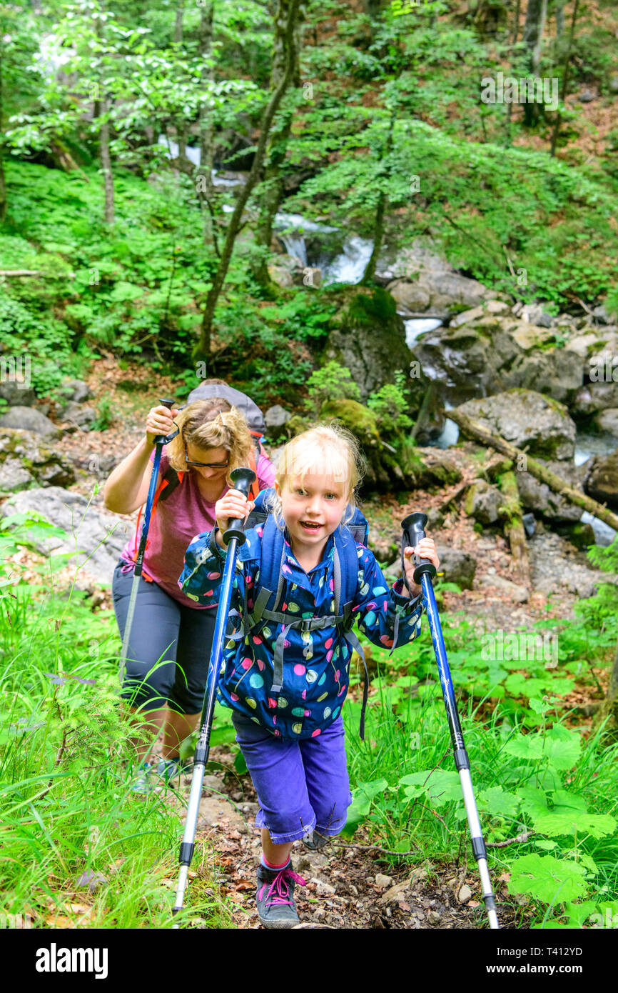 Family doing a hiking tour in impressive nature Stock Photo - Alamy