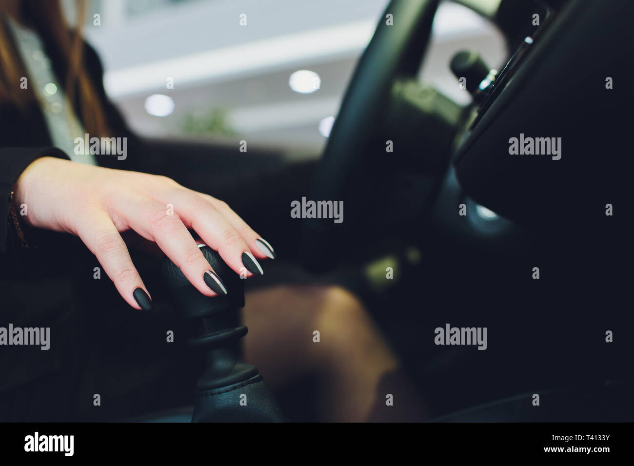 Female hand on the gearbox lever of the car. Manual Transmission. Women ...