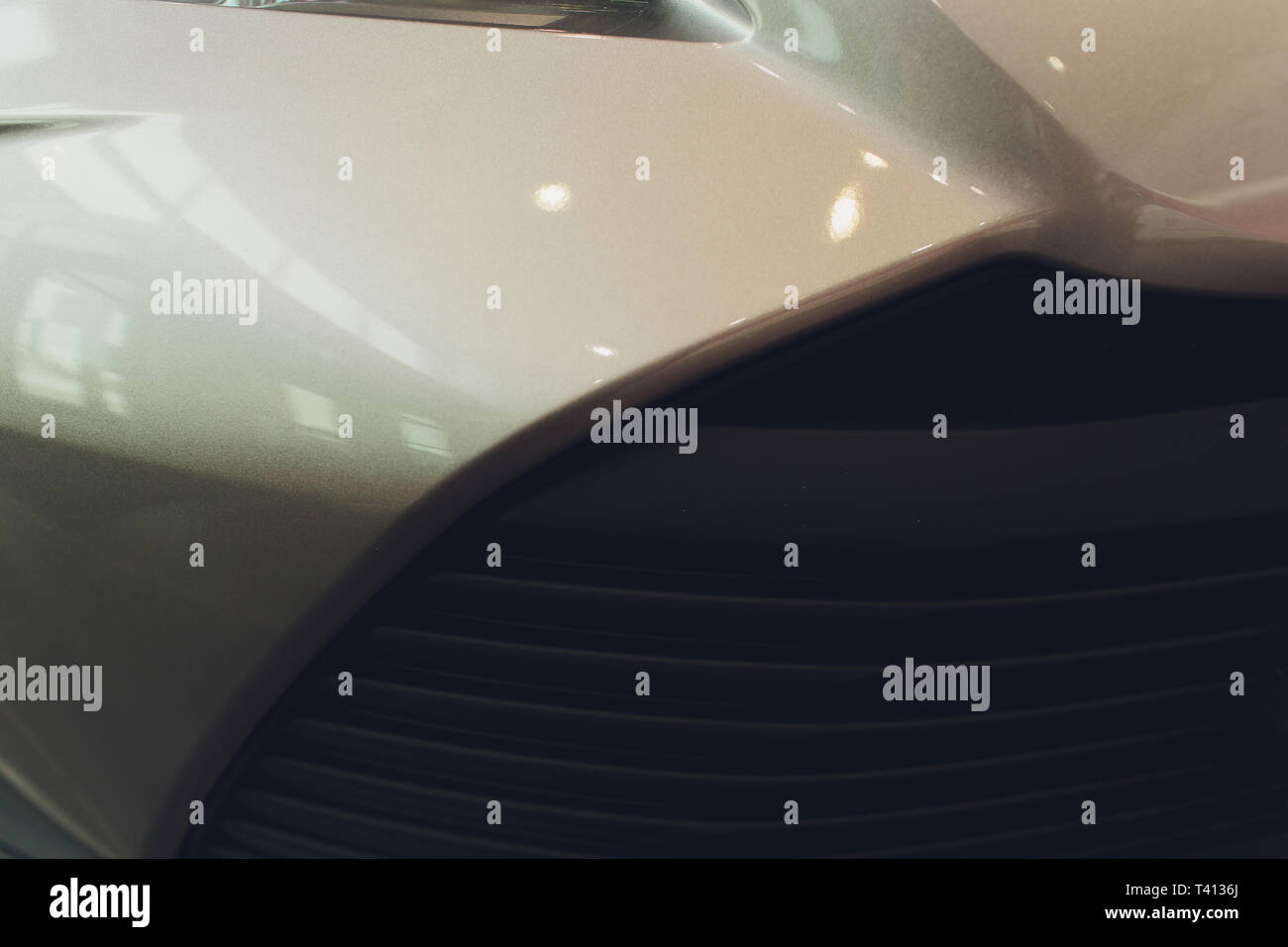 Grid of car with sunflare. Radiator grille. Metal close-up texture ...