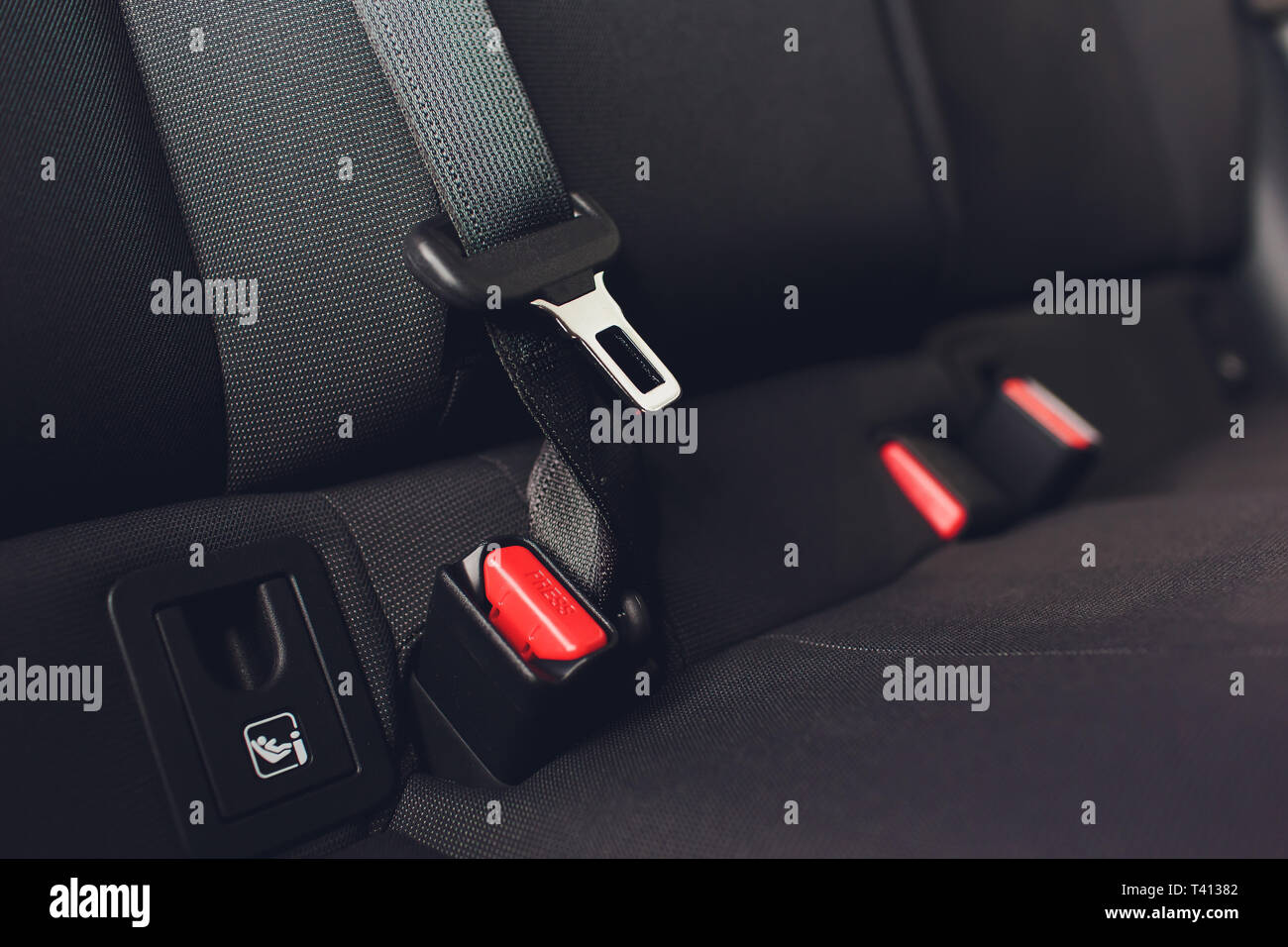 Modern car interior - rear seats with the seat belts Stock Photo - Alamy