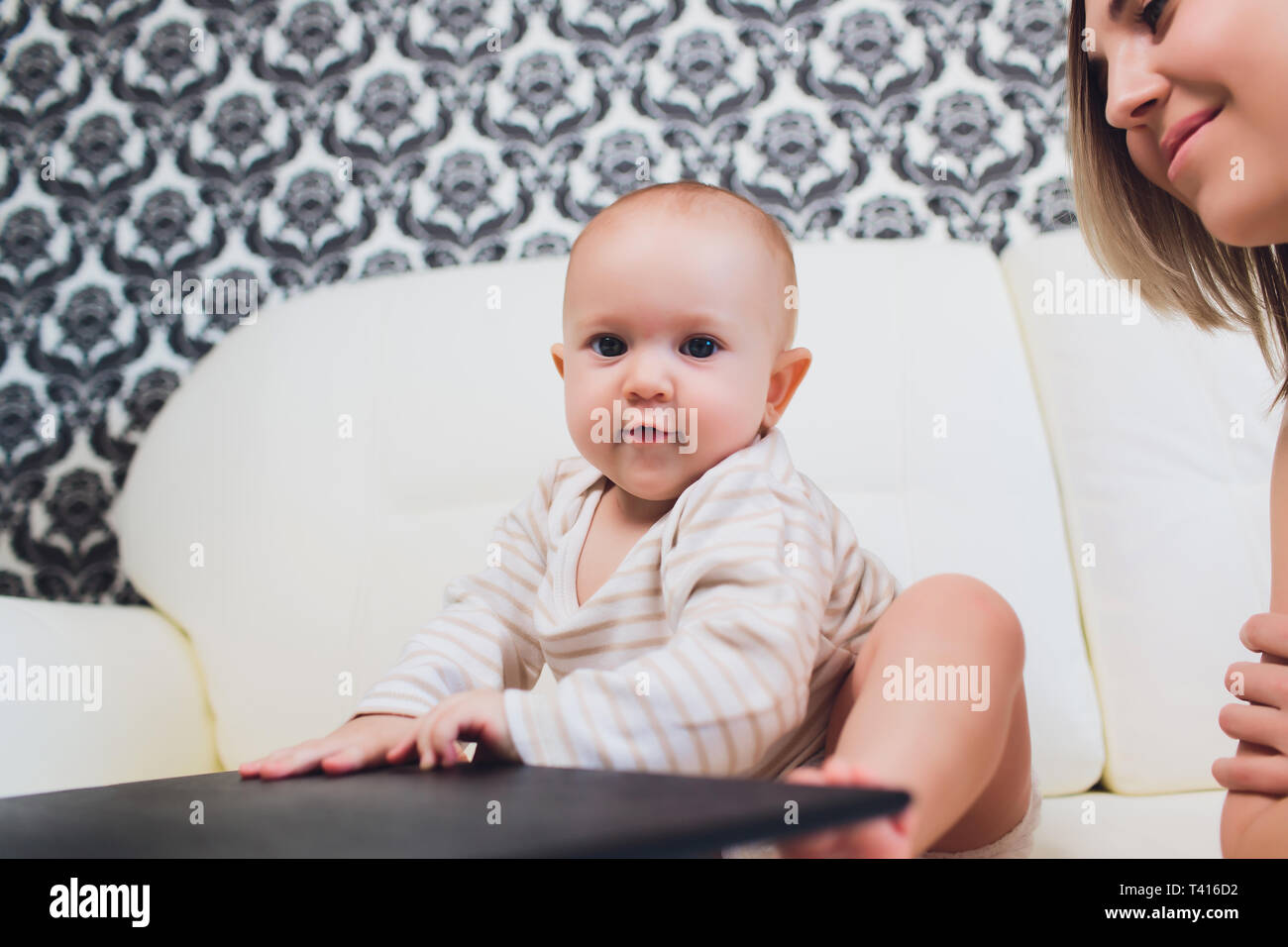 mom freelancer works. child interferes. freelancing problems Stock ...