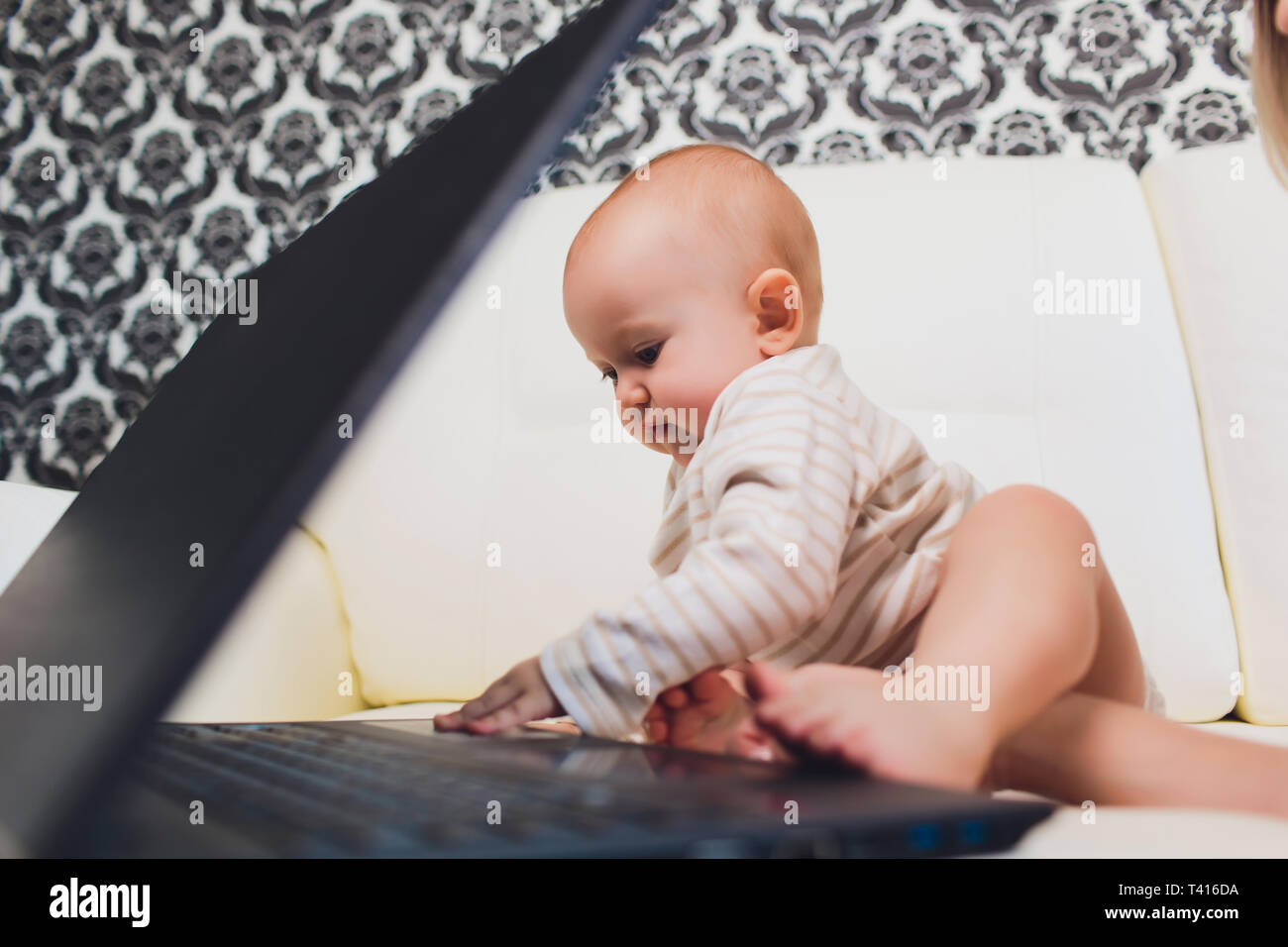 mom freelancer works. child interferes. freelancing problems Stock ...