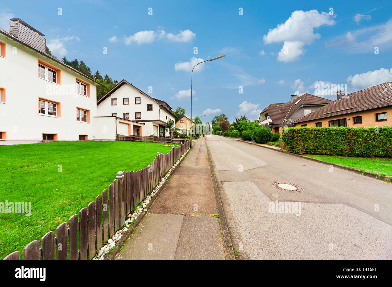 Wide angle view of a street in a German village Stock Photo - Alamy