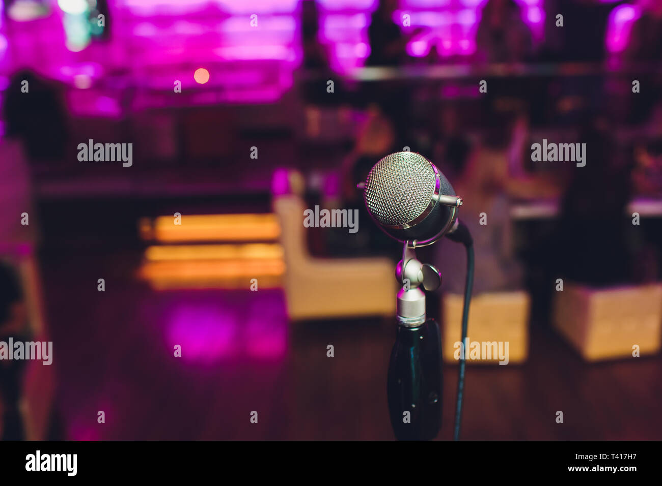 Microphone. Retro microphone. A microphone on stage. A pub. Bar ...