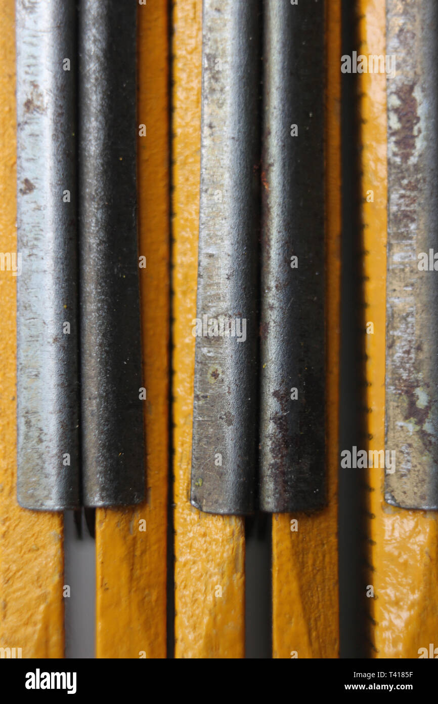 Detail of vintage wooden folding ruler isolated on a white background ...