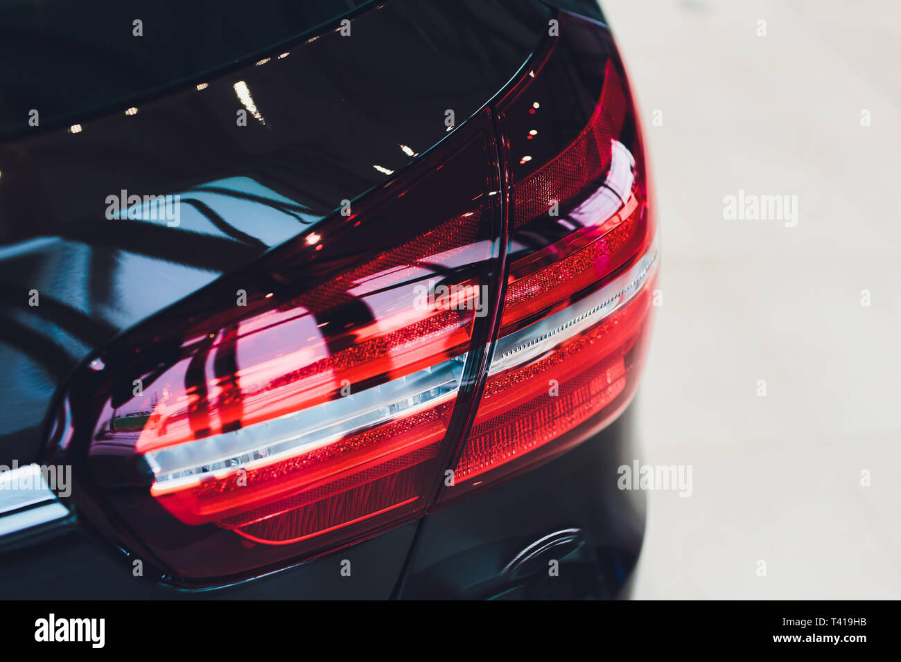 back light, with brilliant reflections auto black body Stock Photo - Alamy