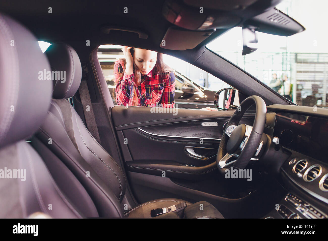 Woman forgot her key inside of her car Stock Photo - Alamy