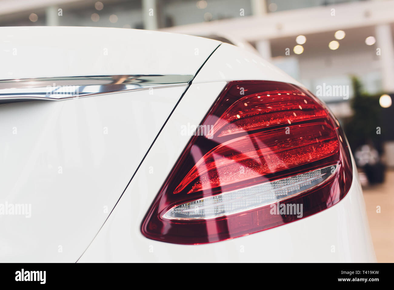 white car side view with sharpness on the door handles hidden in the ...