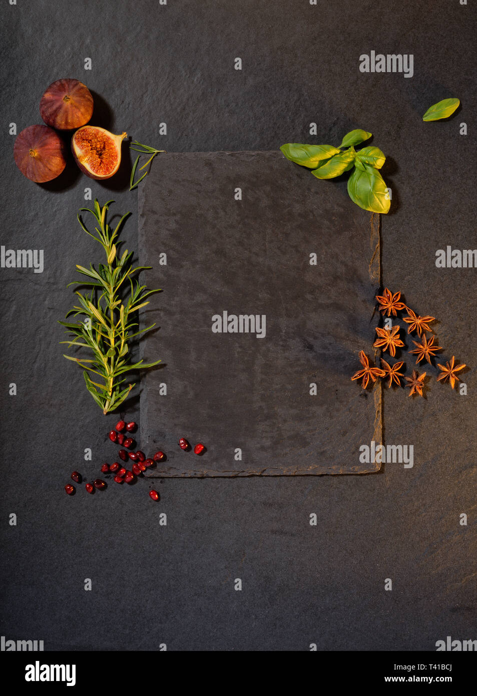 A dark background with various culinary ingredients Stock Photo - Alamy