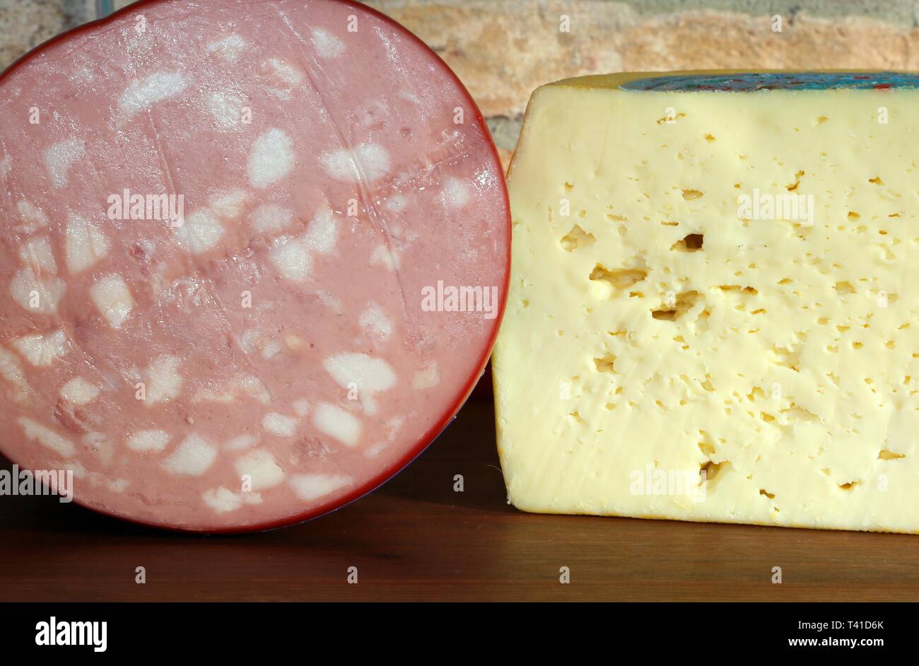 Italian cheese and mortadella in food store Stock Photo - Alamy