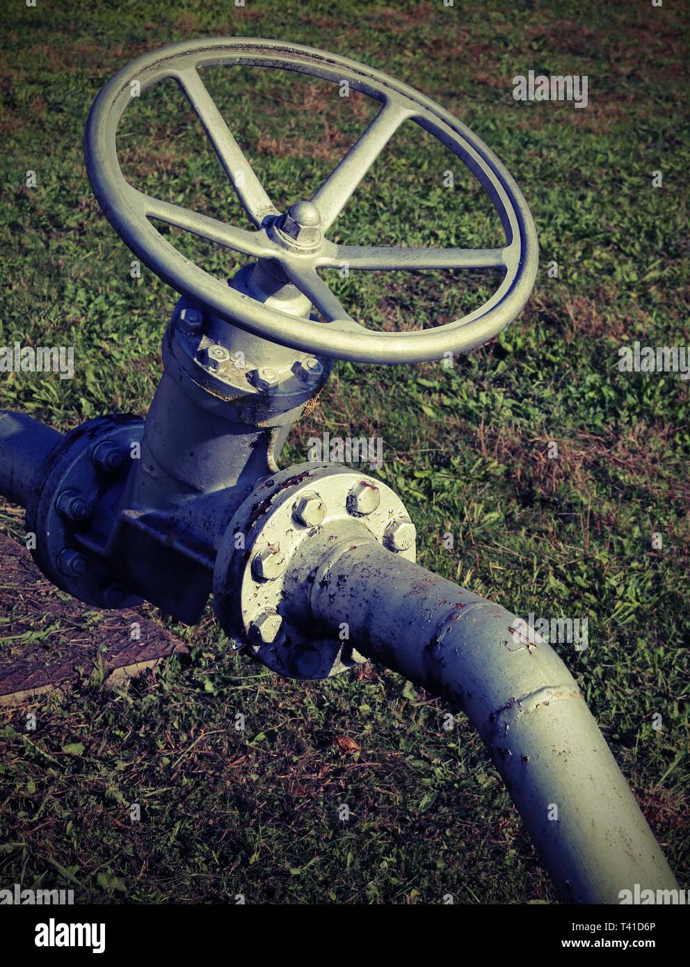 pipe closure valve of the industrial plant and old toned effect Stock ...