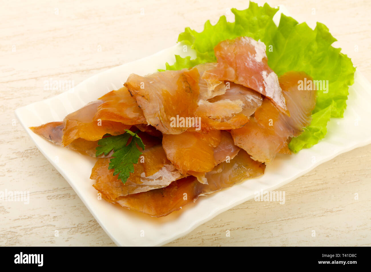 Smoked catfish fillet carpaccio Stock Photo - Alamy