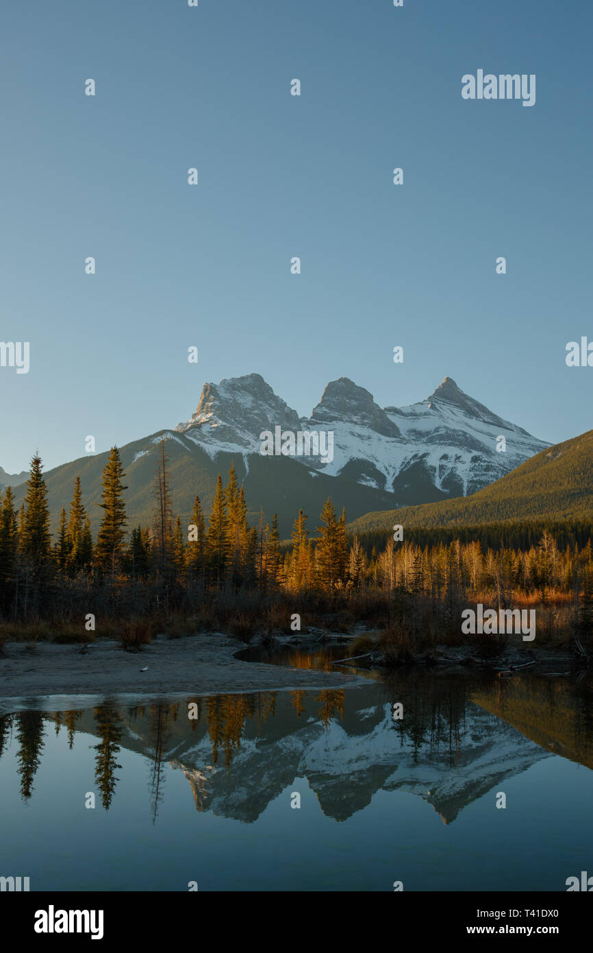 The Three Sisters are a trio of peaks near Canmore, Alberta, Canada ...
