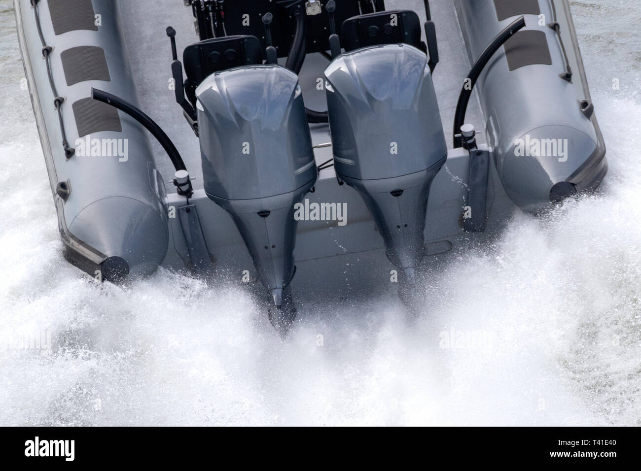 Powerfull outboard engines mounted on a speed boat in action Stock ...