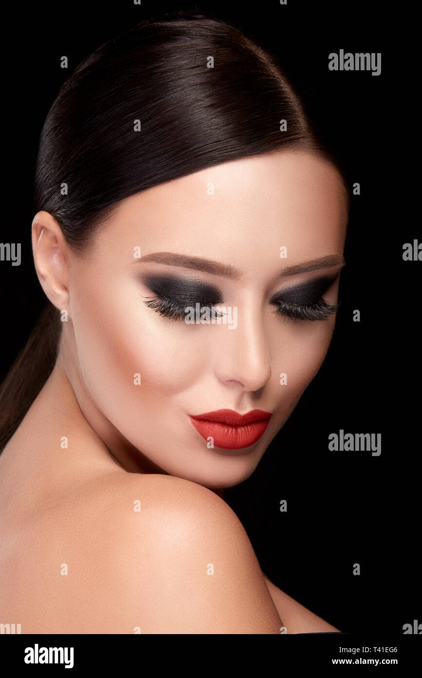 Beautiful girl wearing make up at studio background Stock Photo - Alamy