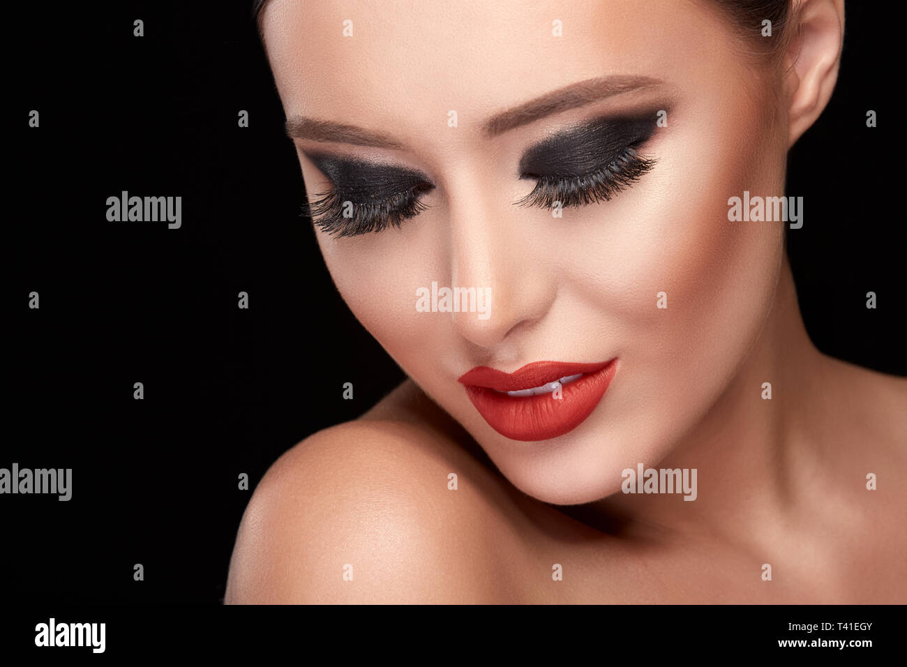 Beautiful girl wearing make up at studio background Stock Photo - Alamy