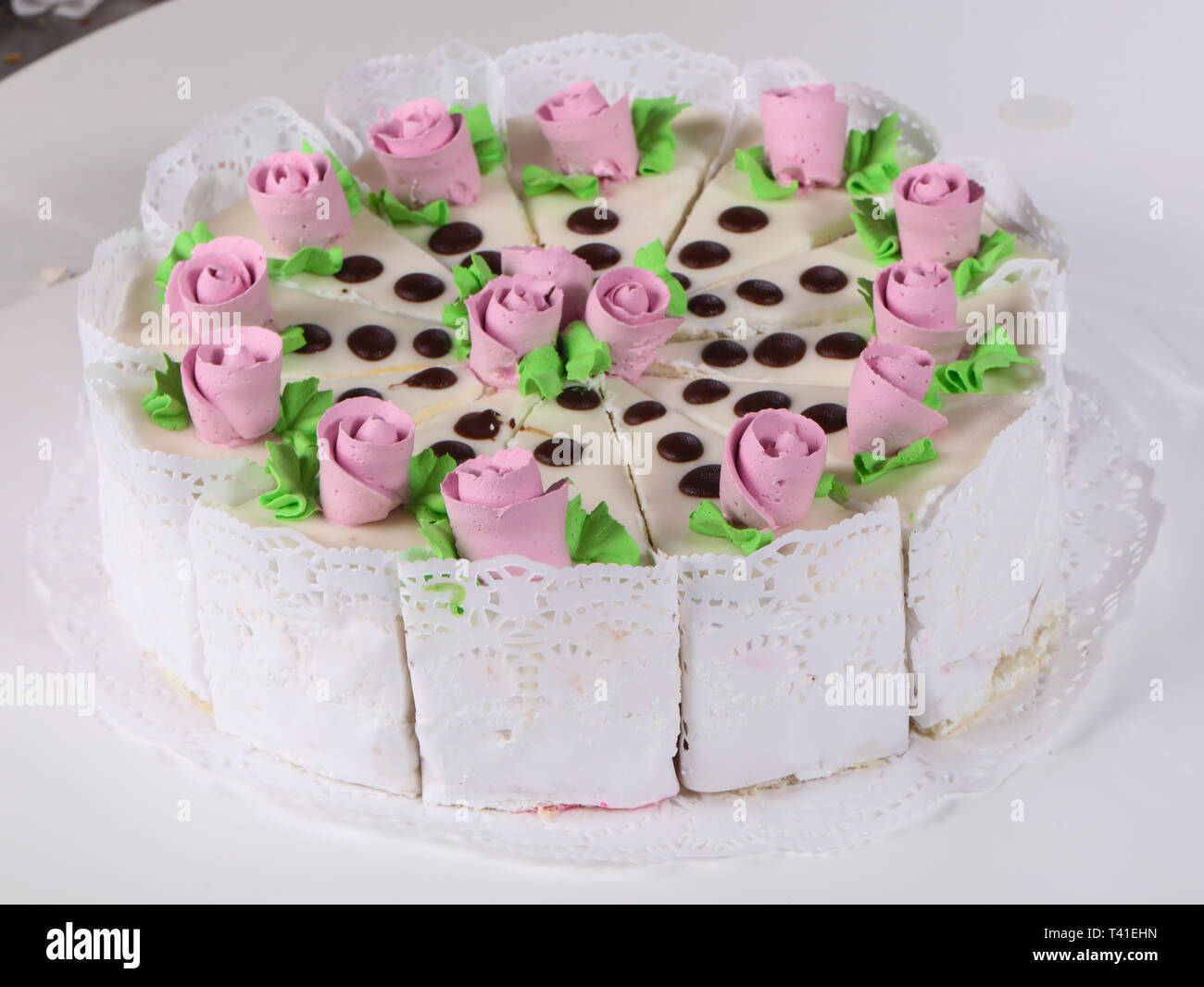 Tasty Cake with cream flowers Stock Photo - Alamy