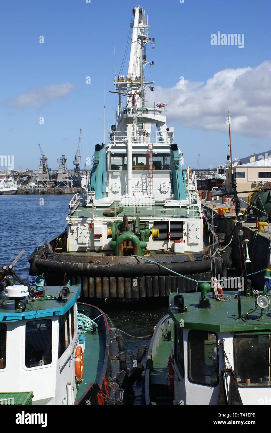 Cable boat, tugs and floating crane in Victoria Basin. Cape Town. SA ...