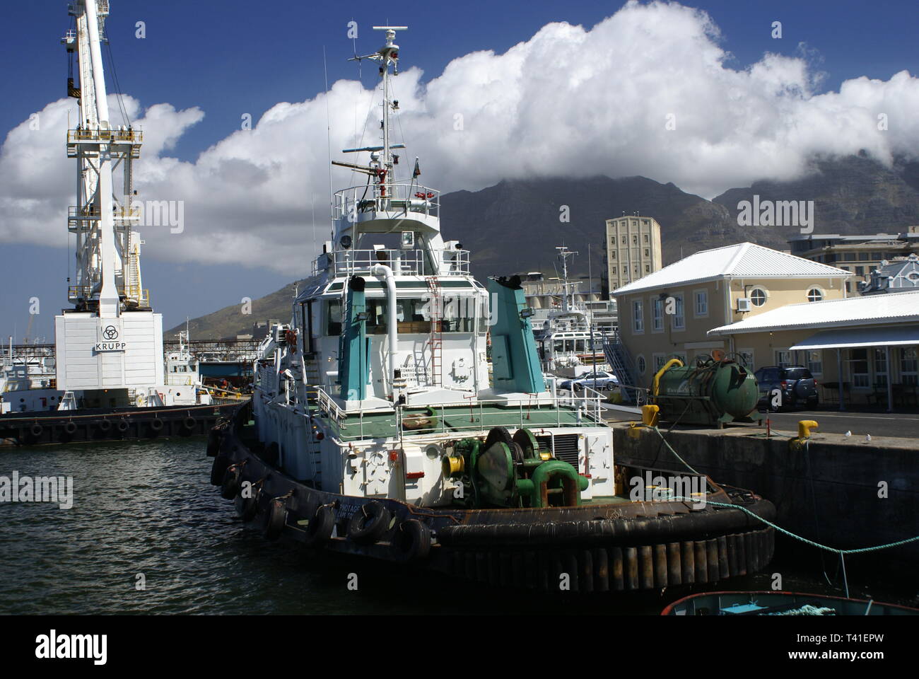 Cable boat, tugs and floating crane in Victoria Basin. Cape Town. SA ...