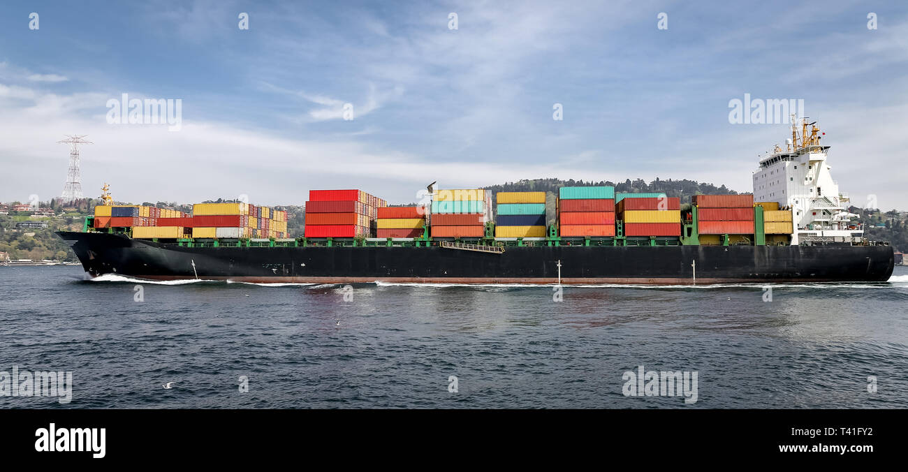 A container ship carrying goods between ports Stock Photo - Alamy