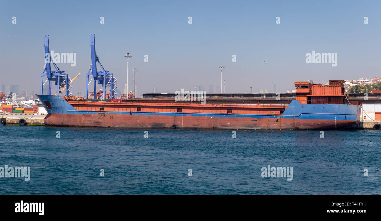 Cargo Ship is Loading in a Port Stock Photo - Alamy