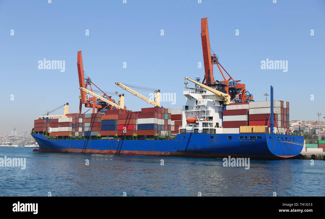 Container Ship is loading in a port Stock Photo - Alamy
