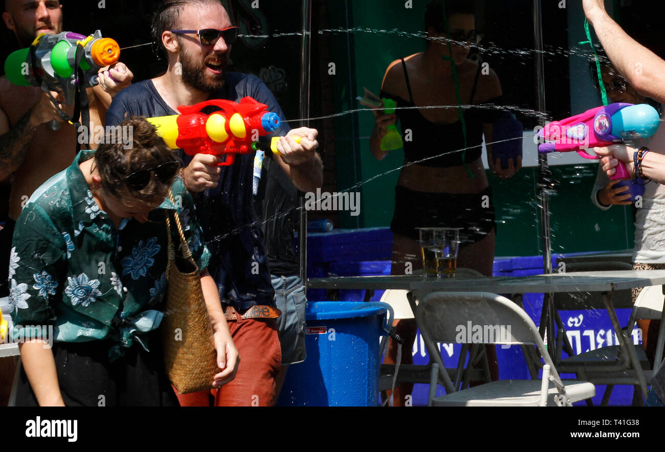 Tourists seen using water guns during the festival. The Songkran ...