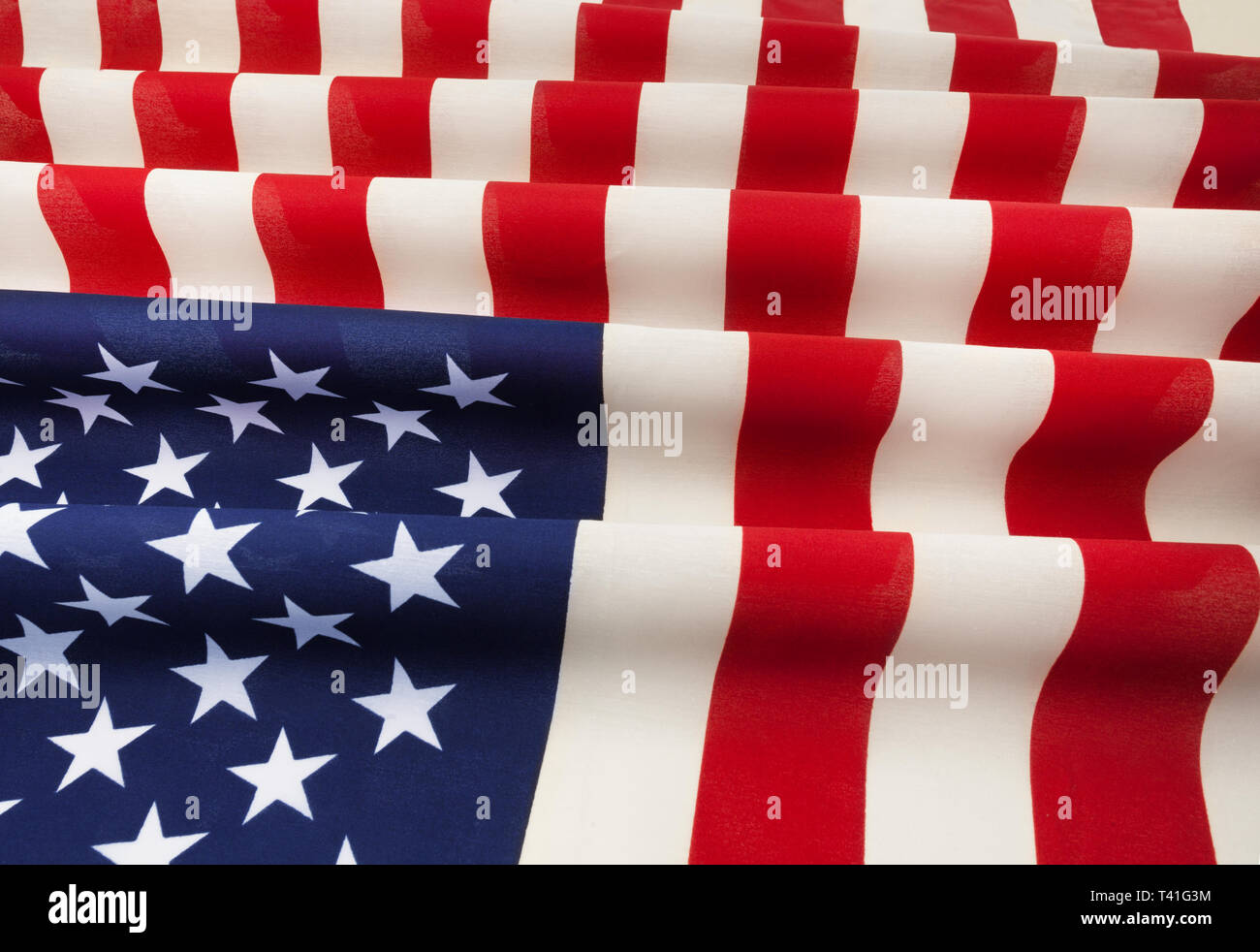 Textile pleated American flag laying on flatness Stock Photo - Alamy