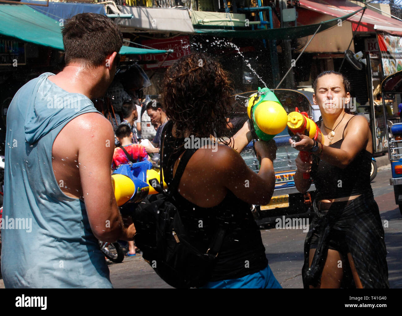 Tourists seen using water guns during the festival. The Songkran ...