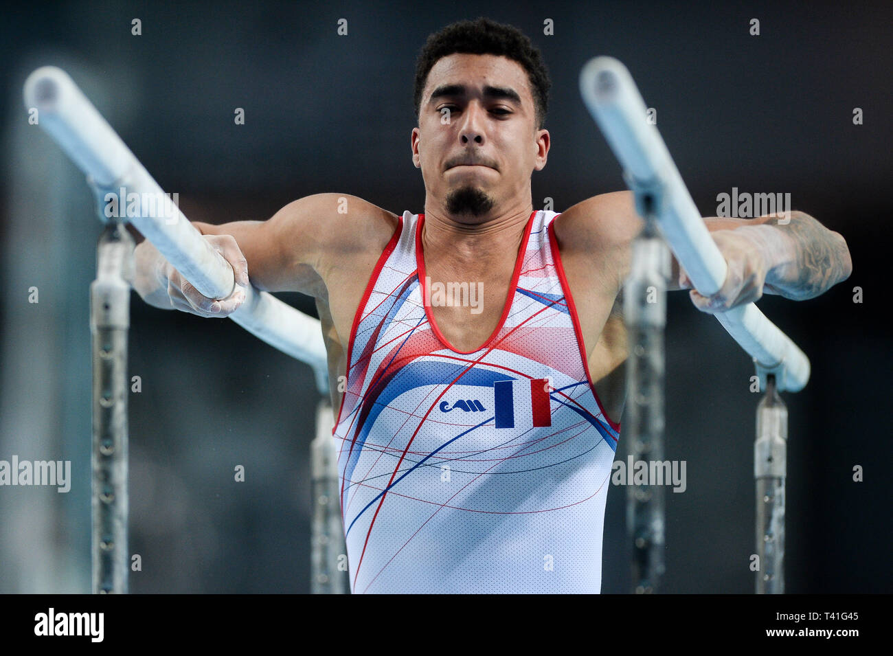 Loris Frasca from France seen in action on the parallel bars during the ...
