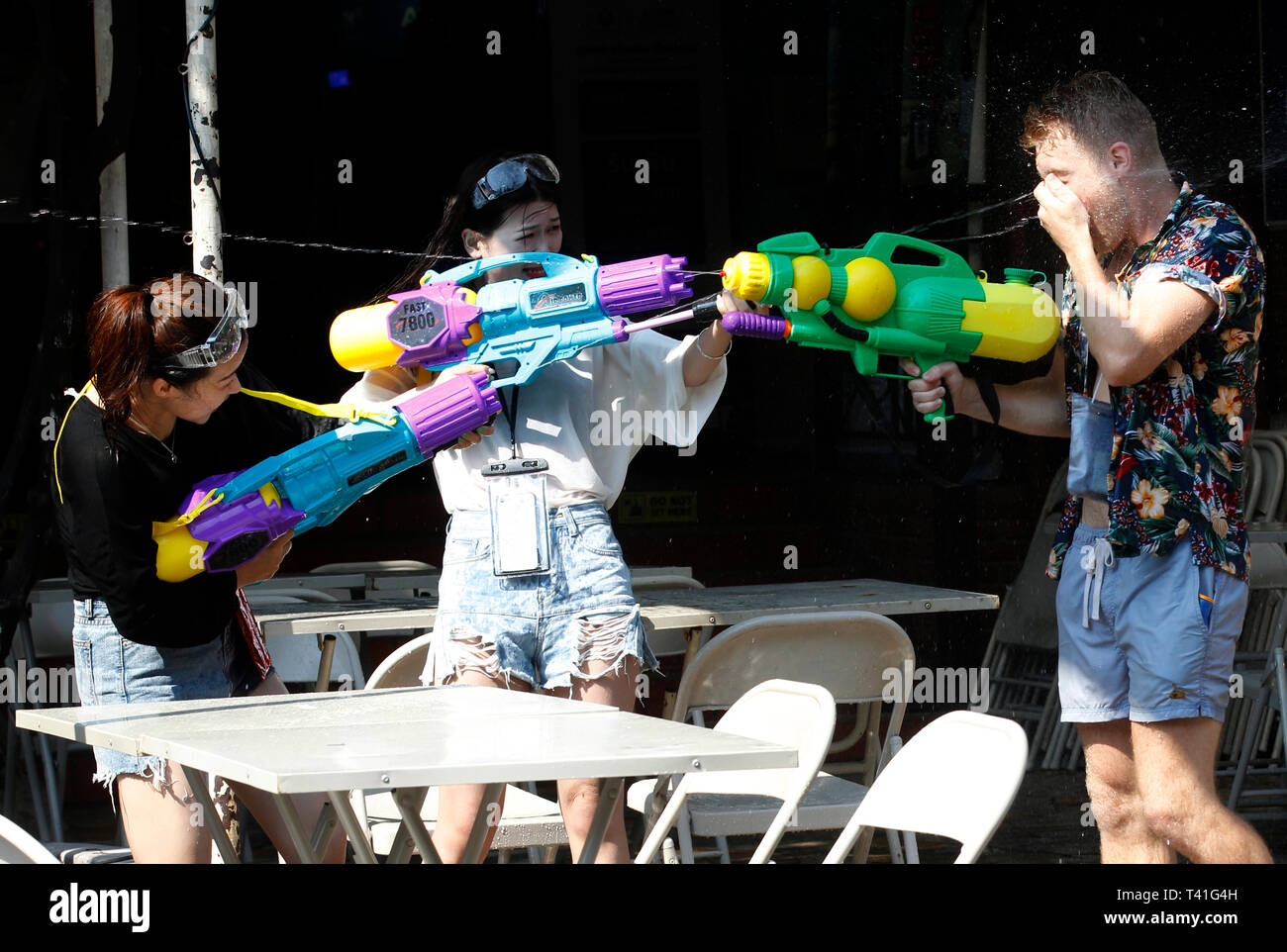 Tourists seen using water guns during the festival. The Songkran ...
