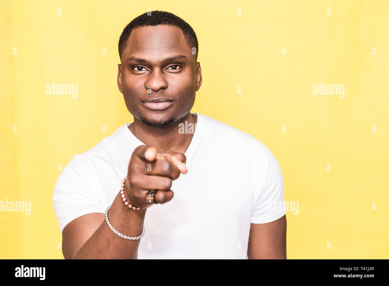 Handsome African American man pointing finger forward at camera Stock ...