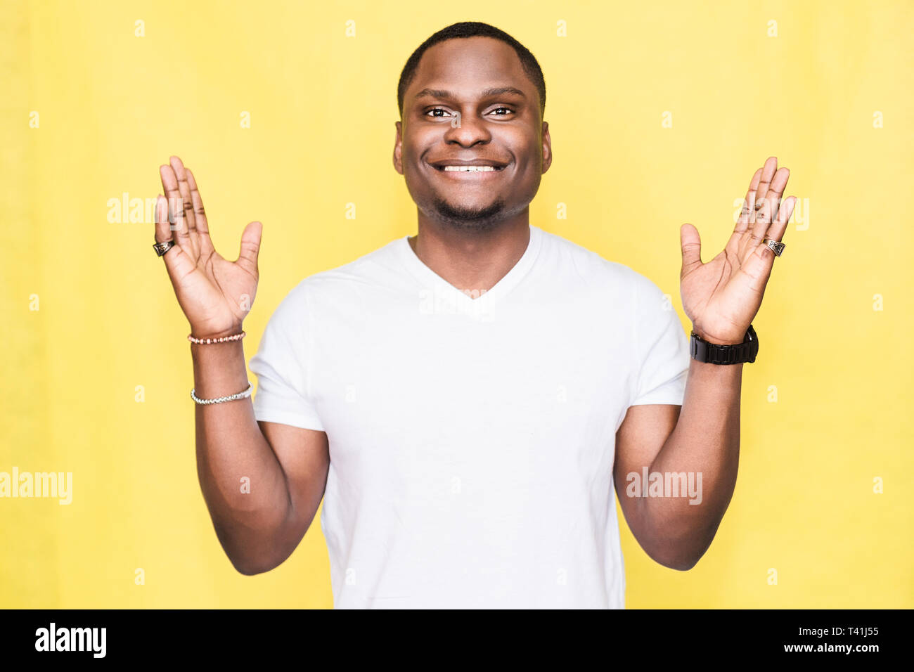 Handsome man showing human hi-res stock photography and images - Alamy
