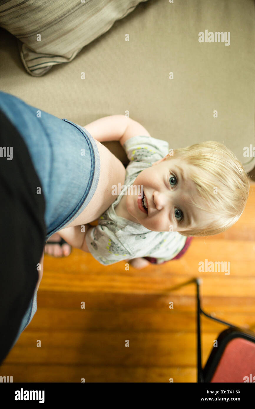 Boy mother leg hi-res stock photography and images - Alamy