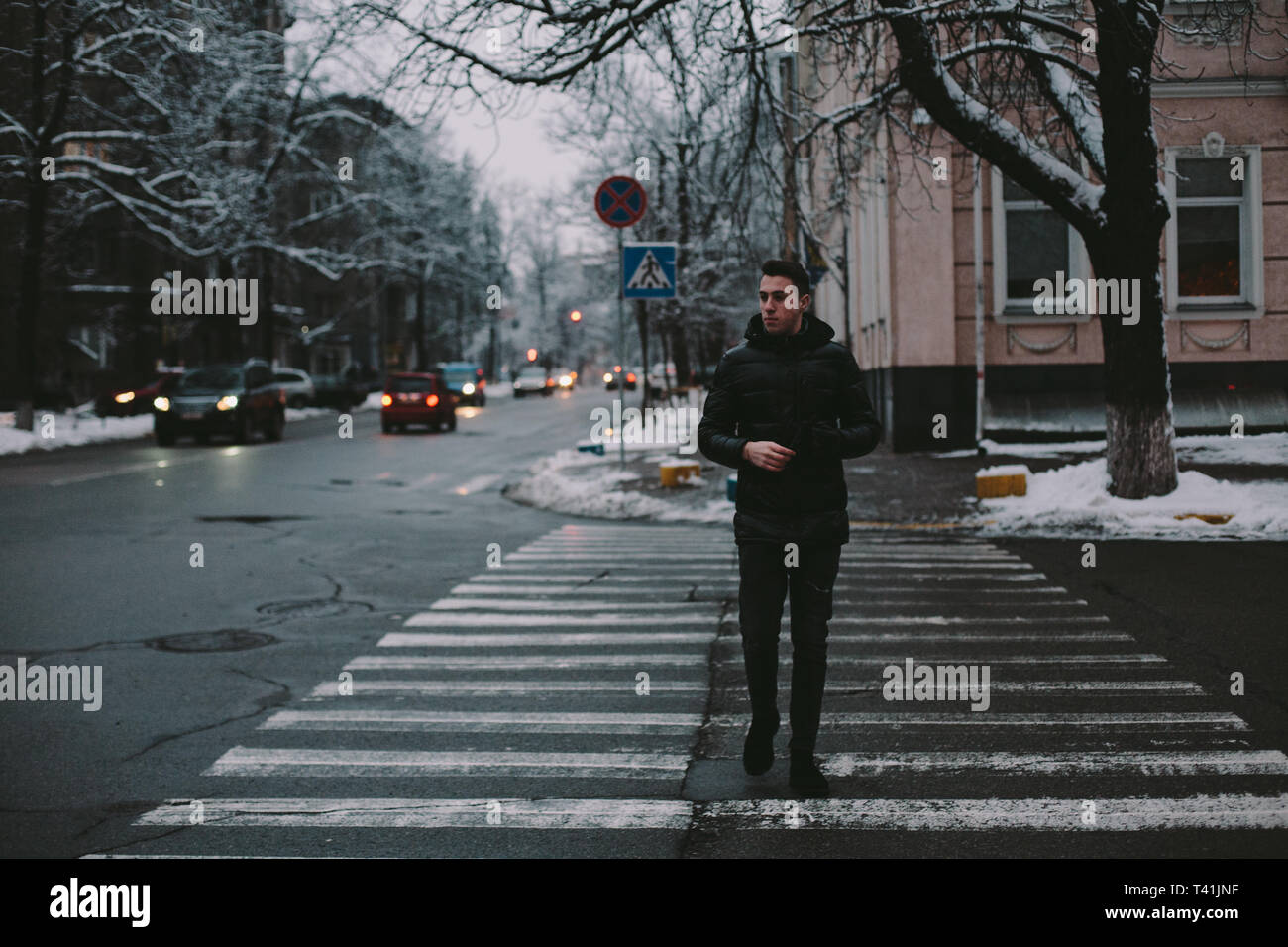 Man crossing road hi-res stock photography and images - Alamy