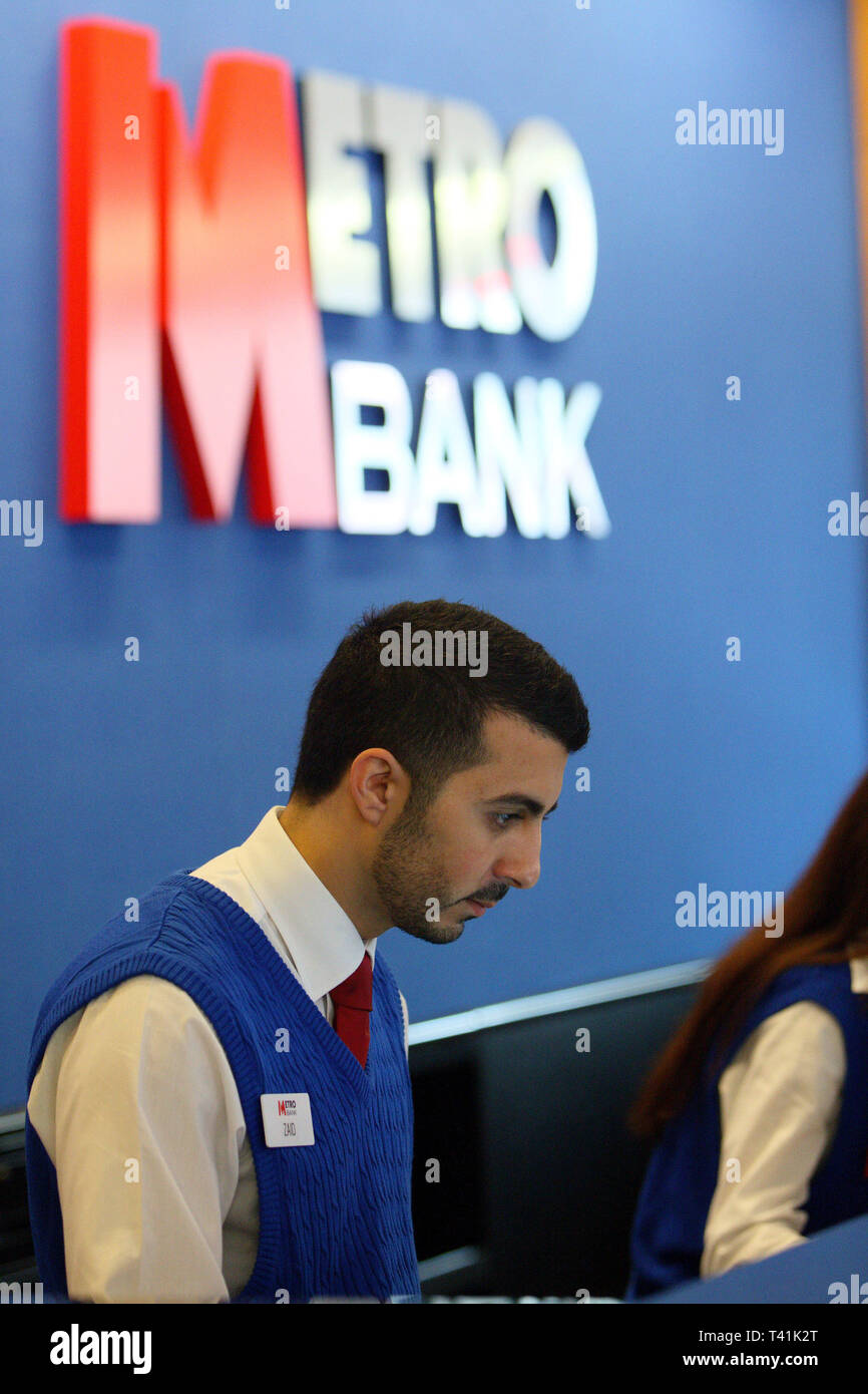 First branch of Metro Bank opens in Holborn. Customer opening an ...